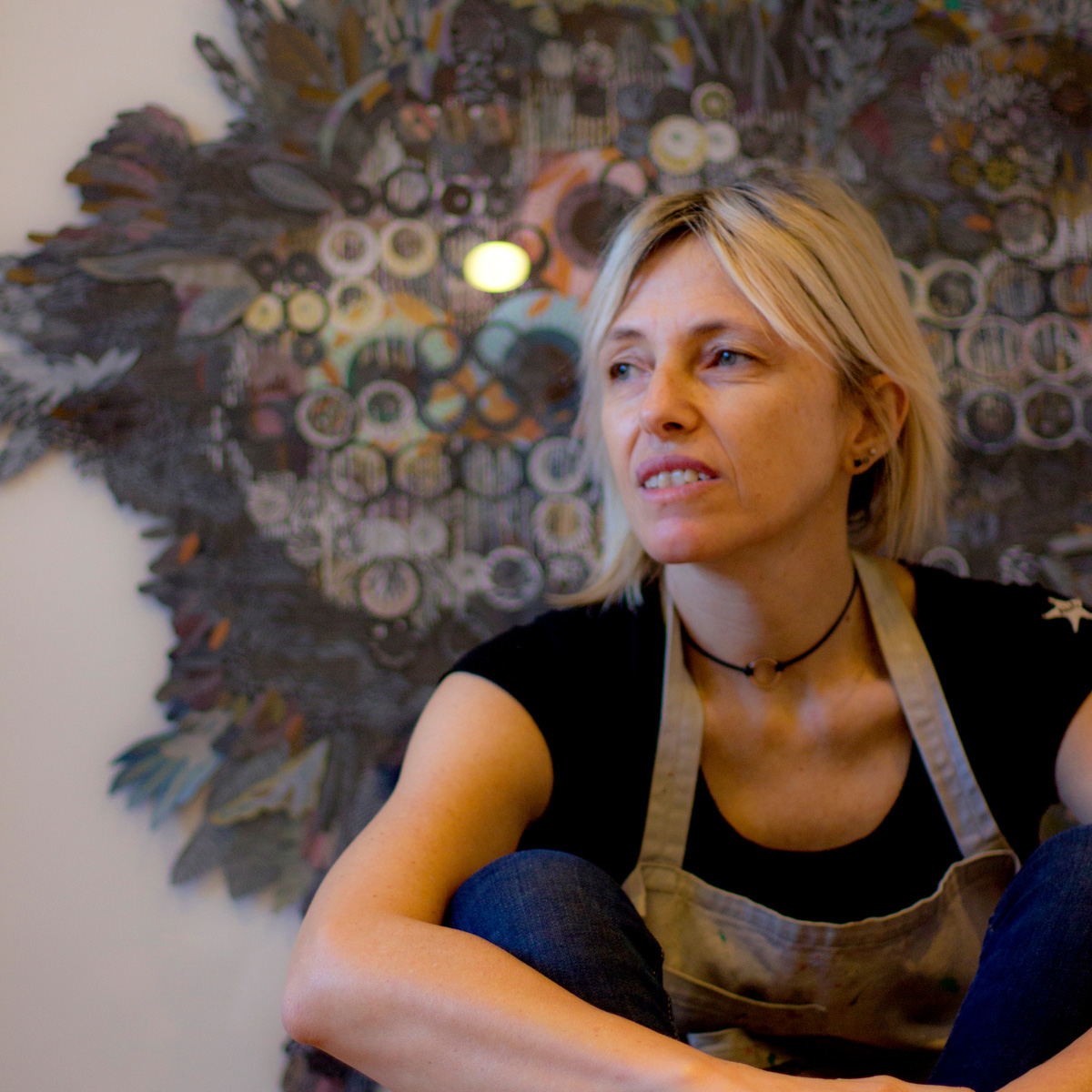 Lia Porto adds embroidery and collages in her art to explore cultural ...